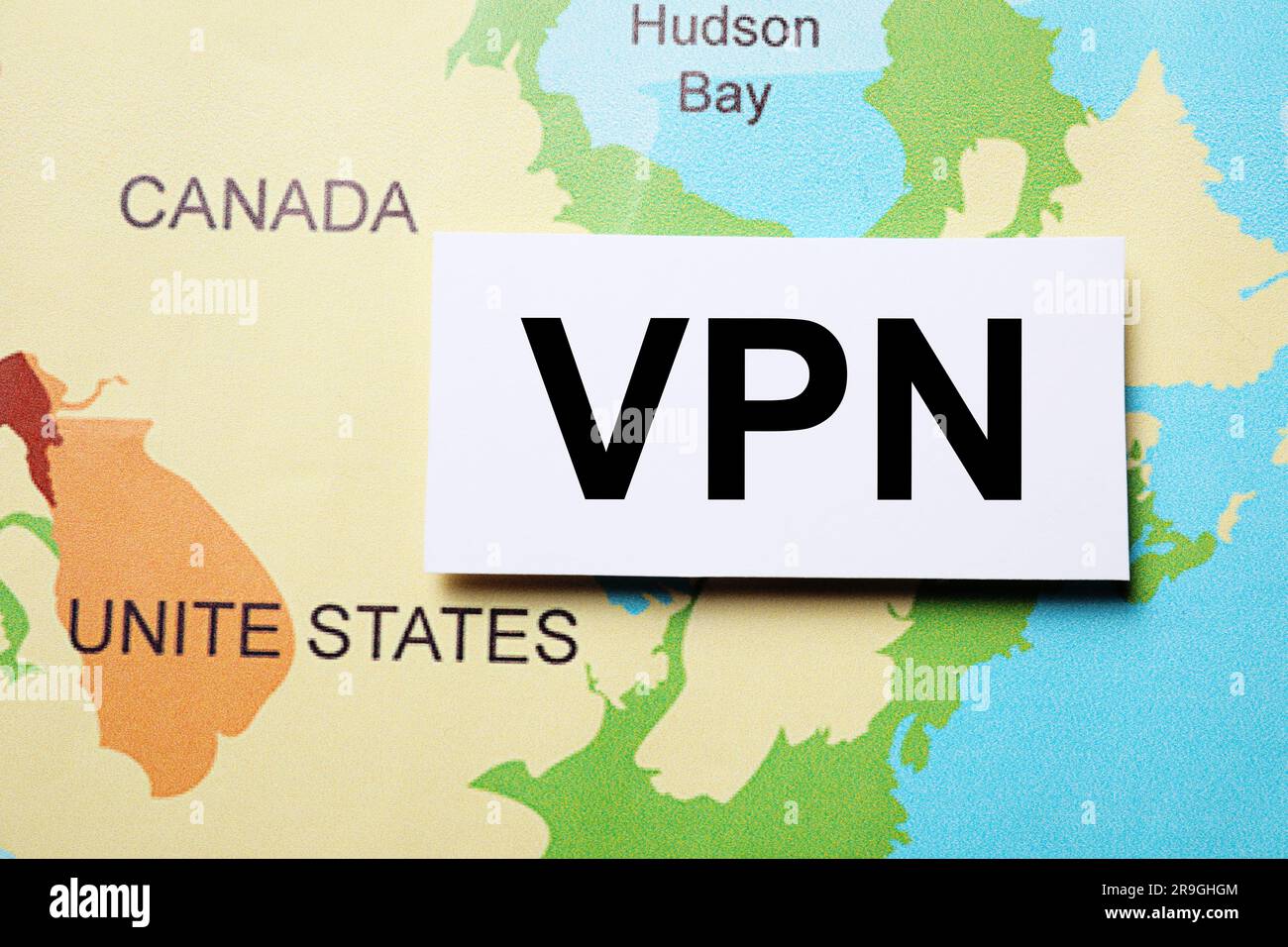 Paper sheet with acronym VPN (Virtual Private Network) on world map ...