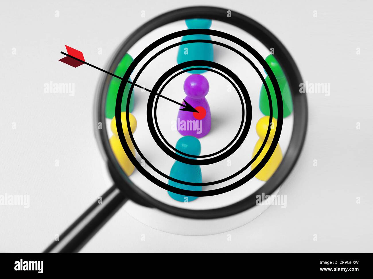 Arrow aiming to pawn, view through magnifying glass with target. White ...