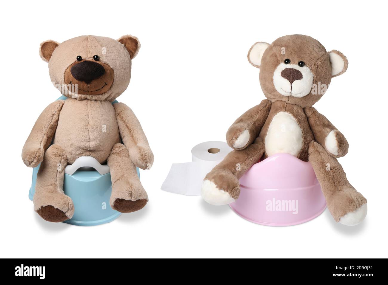 Baby potties with toy bears and toilet paper isolated on white Stock ...