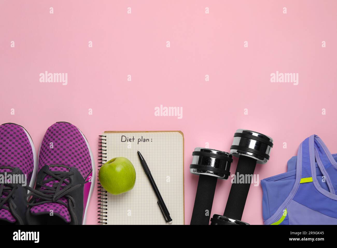 Weight loss concept. Flat lay composition with sneakers, fitness items ...