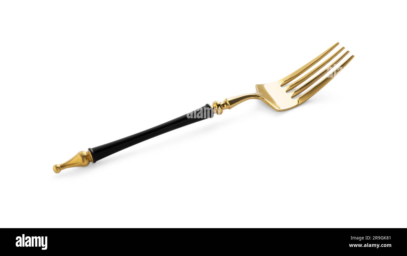 One shiny golden fork isolated on white Stock Photo - Alamy