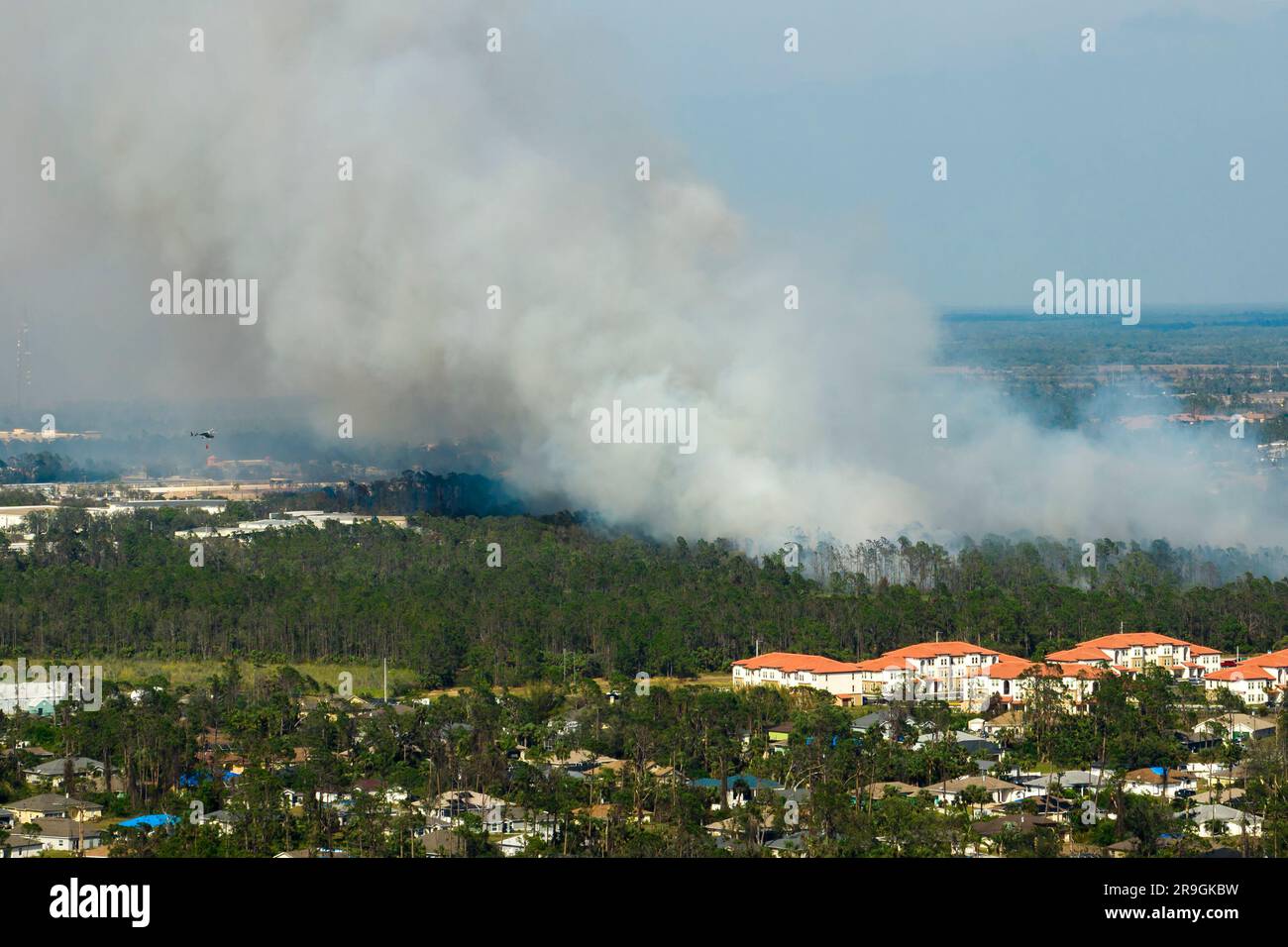 View from above of lagre wildfire burning severely in North Port city ...