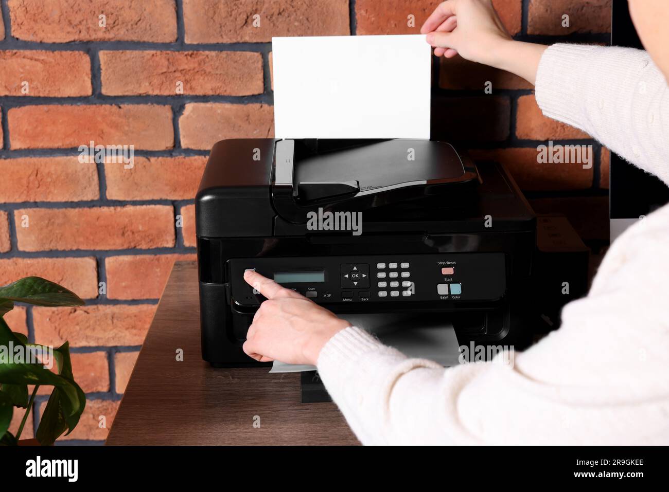 Person using printer at home hi-res stock photography and images - Alamy