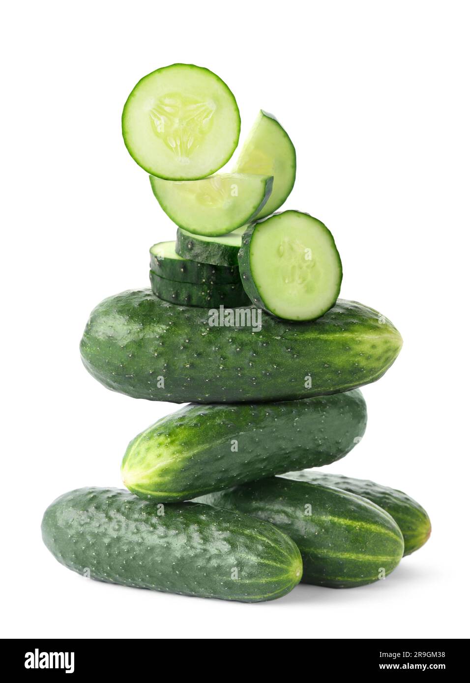 Cut and whole fresh cucumbers isolated on white Stock Photo - Alamy