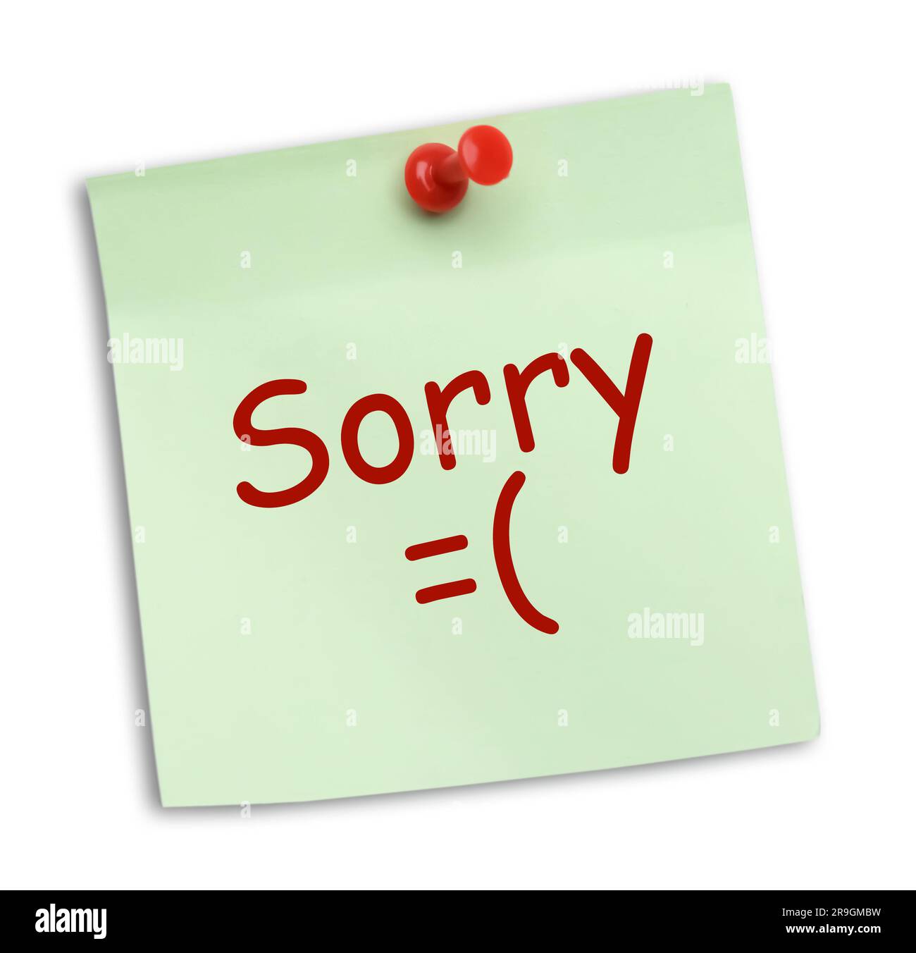 Apology. Sticky note with word Sorry and drawn sad face pinned on white ...