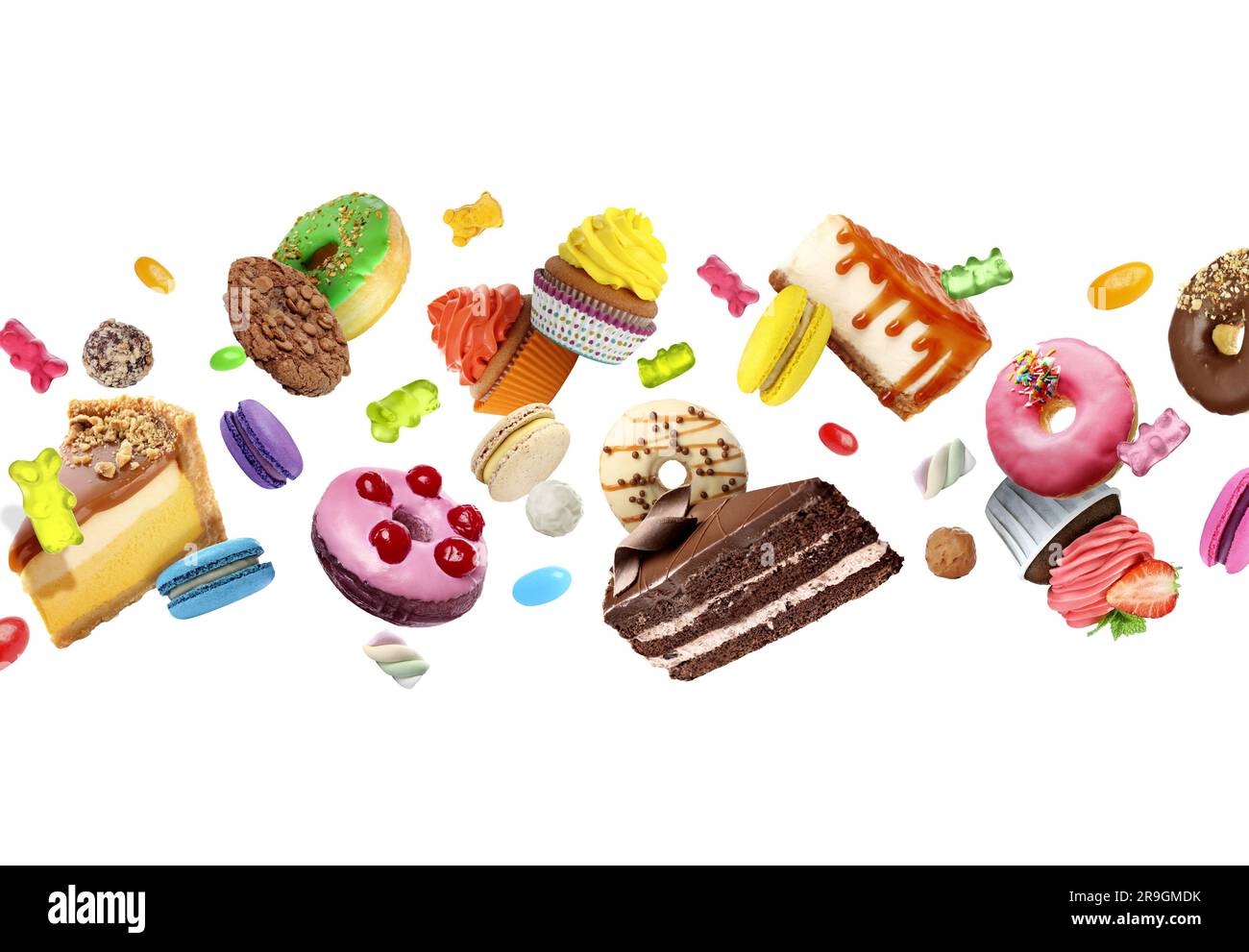 Many delicious sweets flying on white background Stock Photo - Alamy