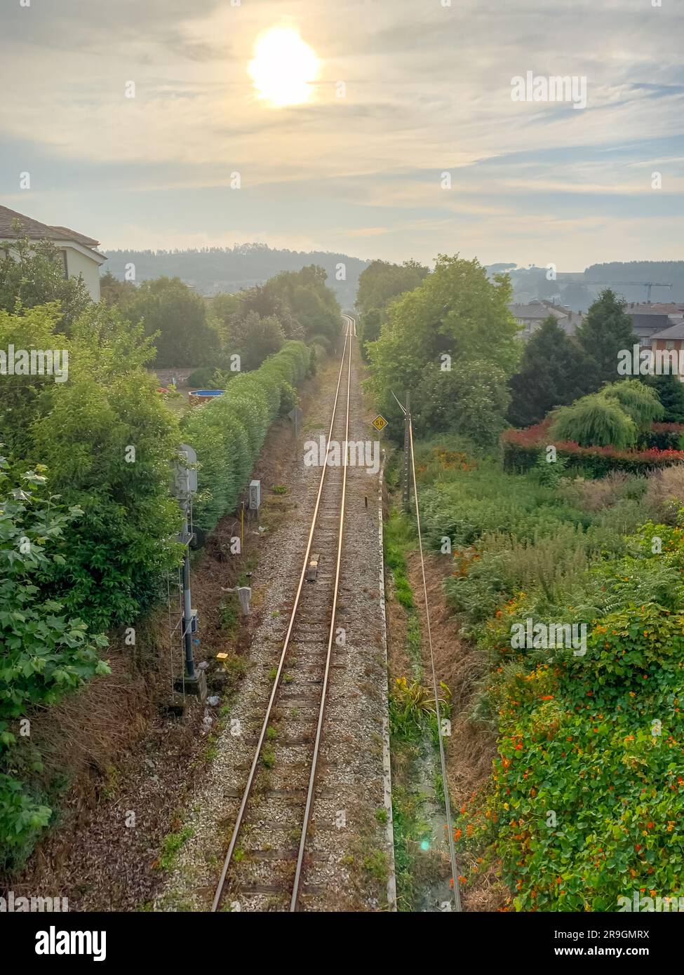 Railroad tracks at sunset. Railway line against colorful blue sky ...