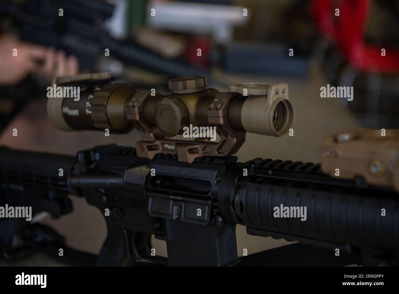 A Direct View Optic is attached to an M4 carbine during a Security ...