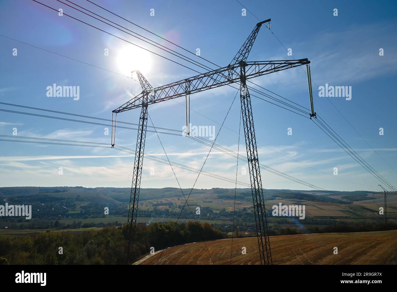 High voltage tower with electric power lines transfening electrical ...