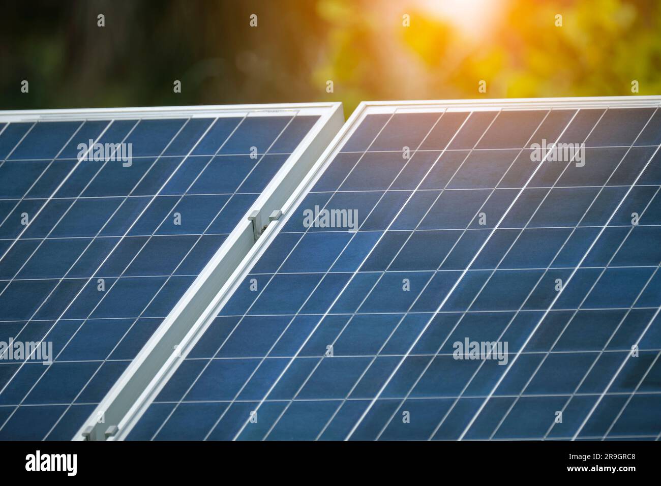 Solar photovoltaic panels mounted on stand-alone frame on backyard ...