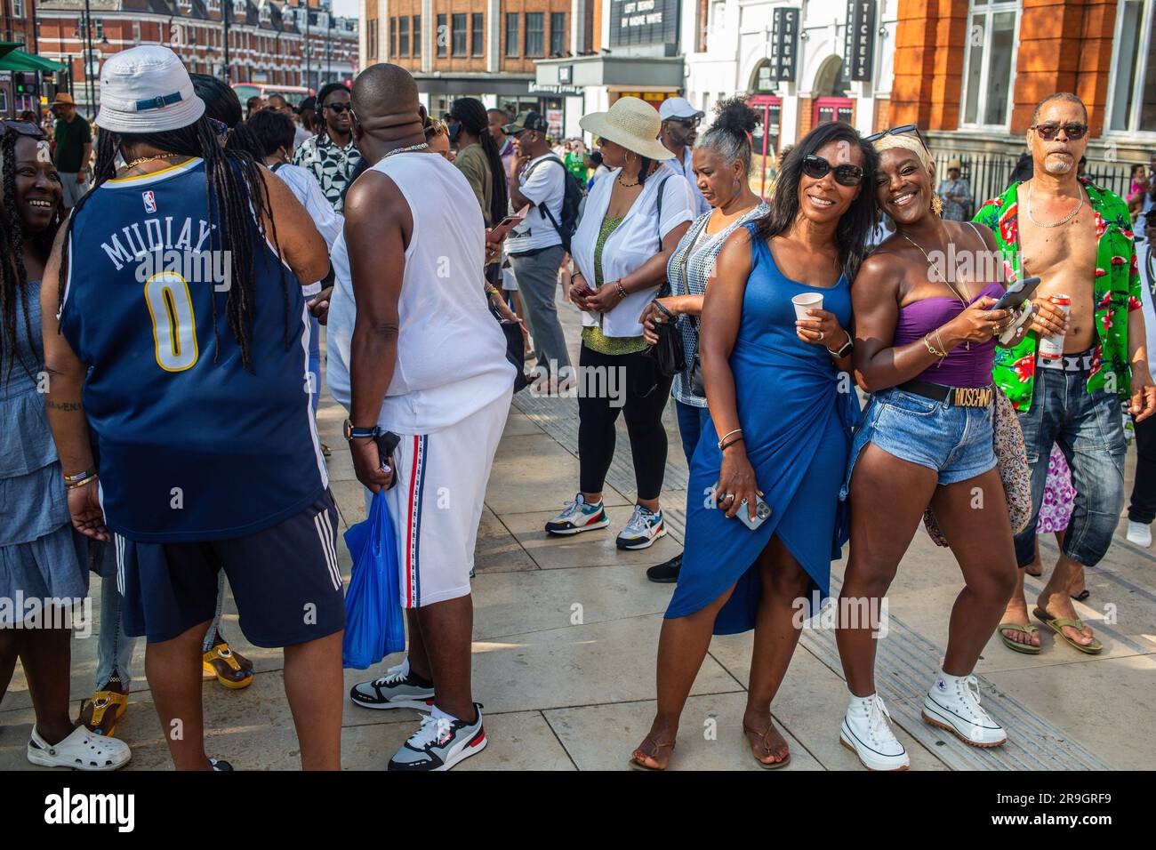 London, UK. 25th June, 2023. People seen gathering at Windrush Square ...
