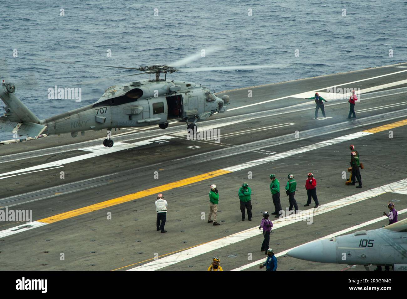 230621-N-FQ639-1700 SOUTH CHINA SEA (June 21, 2023) Sailors observe an ...