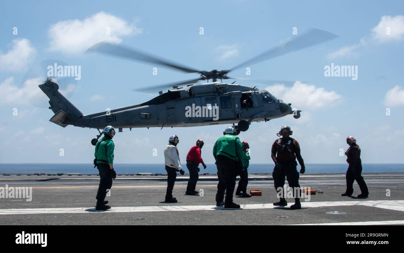 230623-N-UF592-3048 SOUTH CHINA SEA (June 23, 2023) Sailors observe as ...