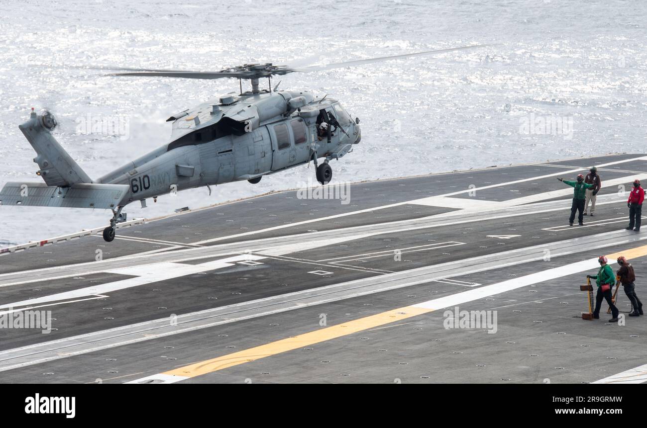 230621-N-UF592-1063 SOUTH CHINA SEA (June 21, 2023) Sailors observe as ...