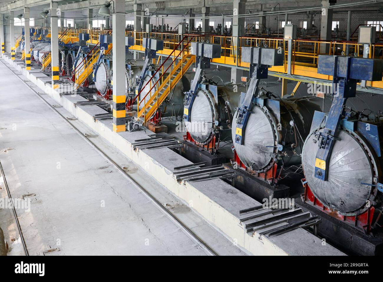 Autoclave workshop with tanks for concrete blocks hardening Stock Photo ...