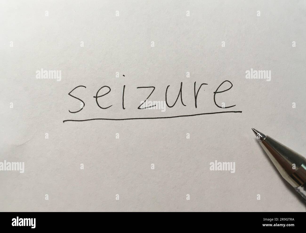 Seizure concept word on paper background Stock Photo - Alamy