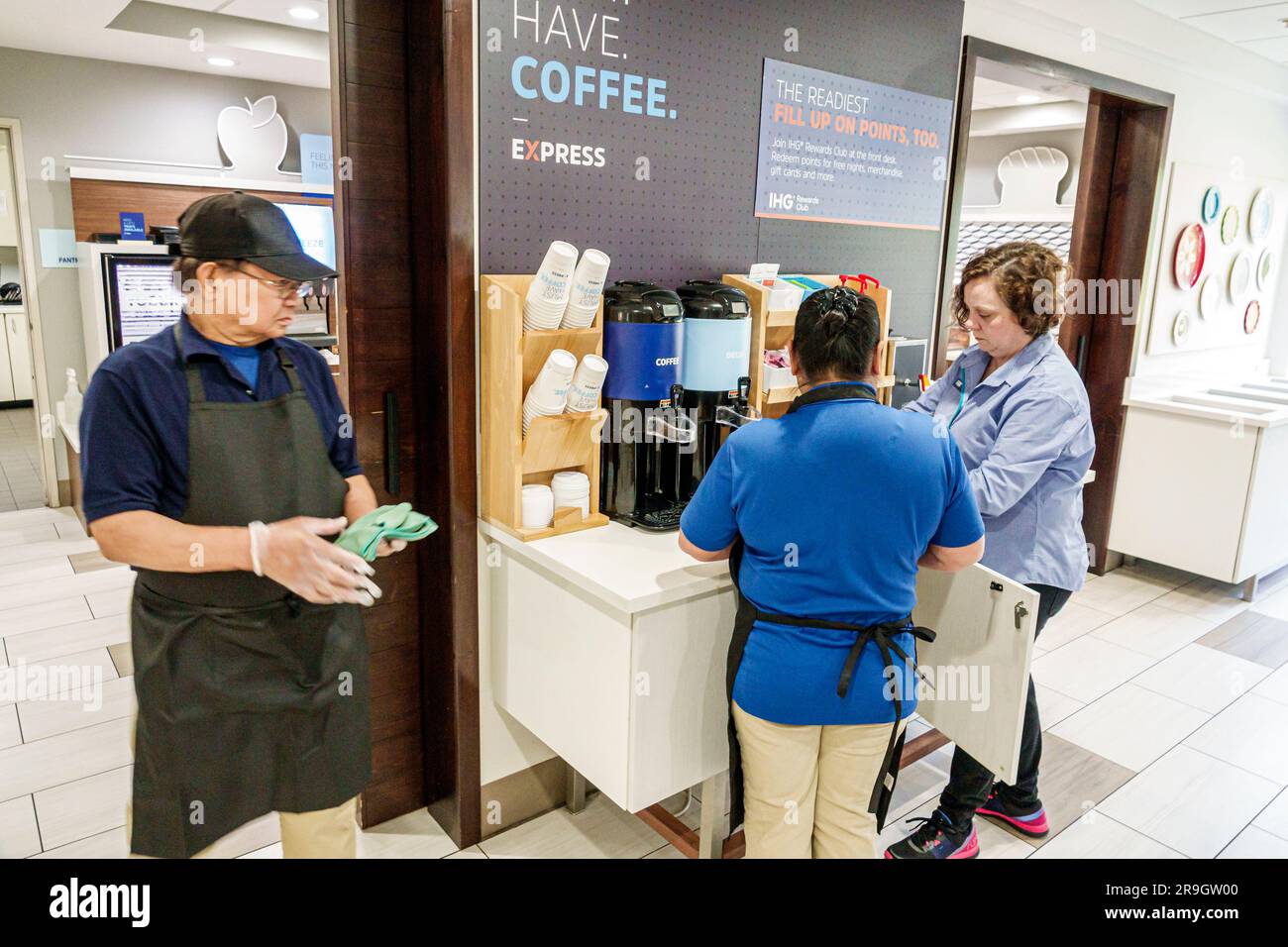 Refilling coffee dispenser hi-res stock photography and images - Alamy