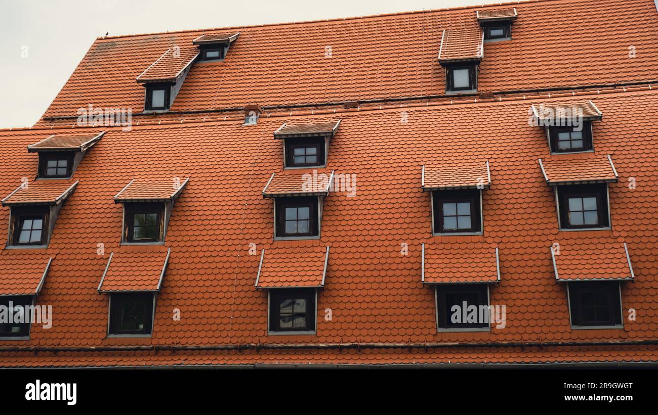 Corner with dormers Red Roofs of the city brown metal tiles roof of ...