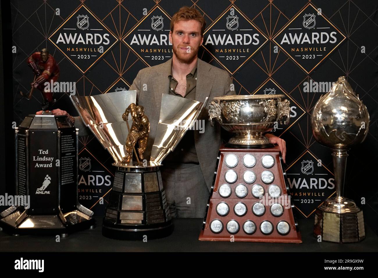 Edmonton Oilers hockey player Connor McDavid poses with the Ted Lindsey ...