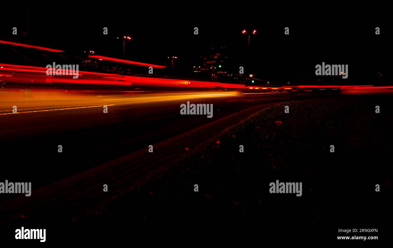 Lights of cars at night. Street line lights. Night highway city. Long ...