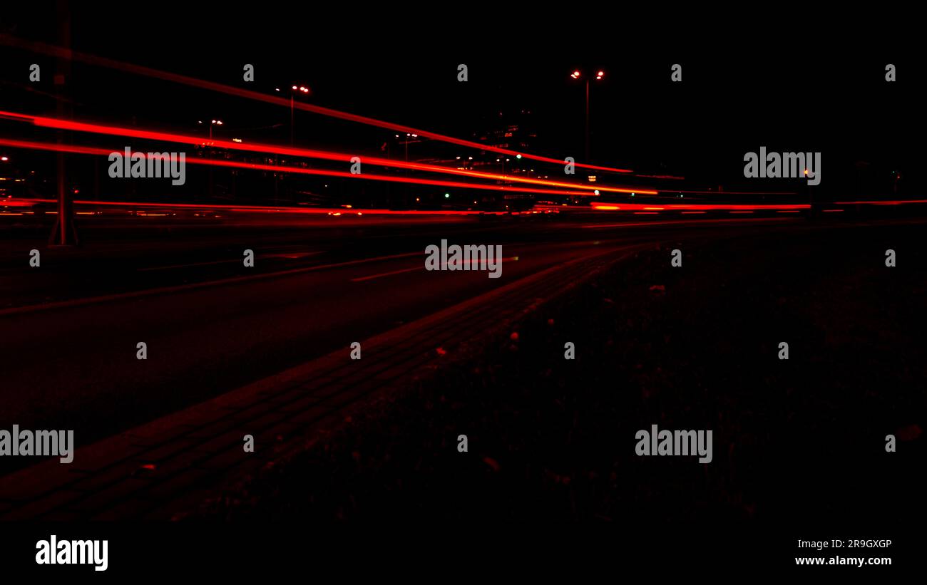 Lights of cars at night. Street line lights. Night highway city. Long ...