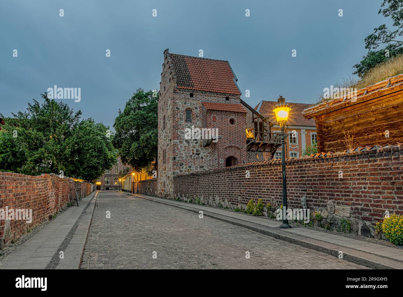 Dekanhuset in the old town of Lund in a dusk summer evening, Adelgatan ...