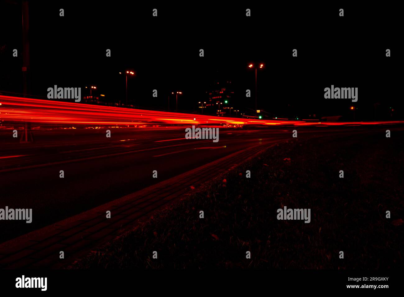 Lights of cars at night. Street line lights. Night highway city. Long ...
