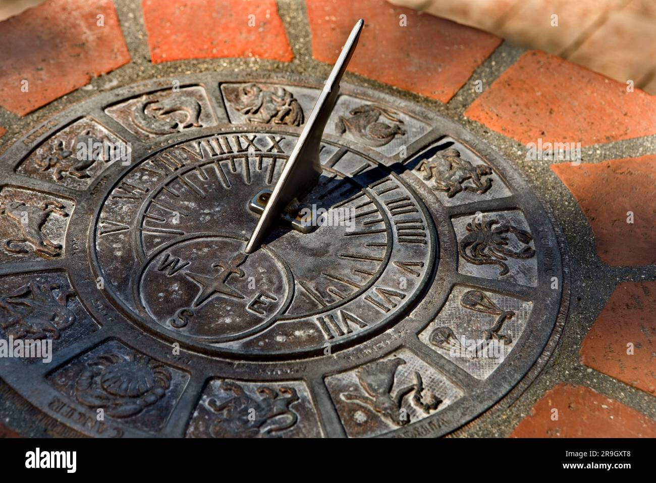 Antique sundial with astrology signs Stock Photo - Alamy