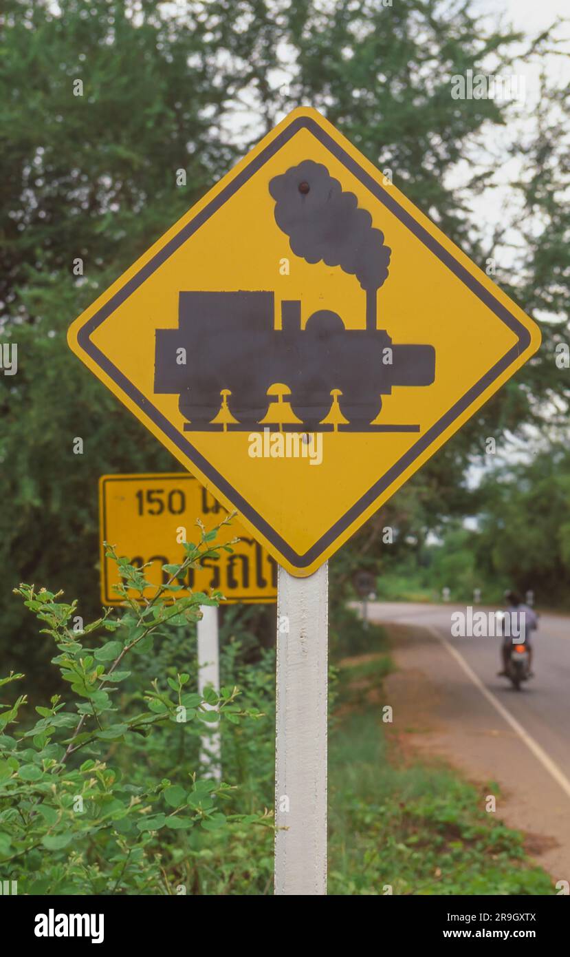 A level-crossing warning sign adjacent to the infamous Death Railway of ...