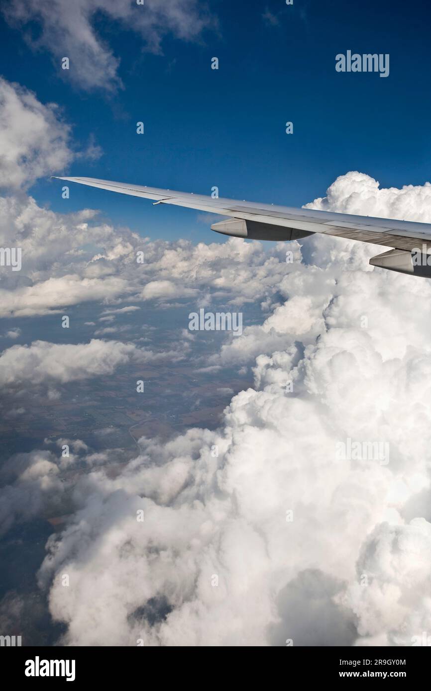 Cloud formation airplane wing at altitude Stock Photo - Alamy