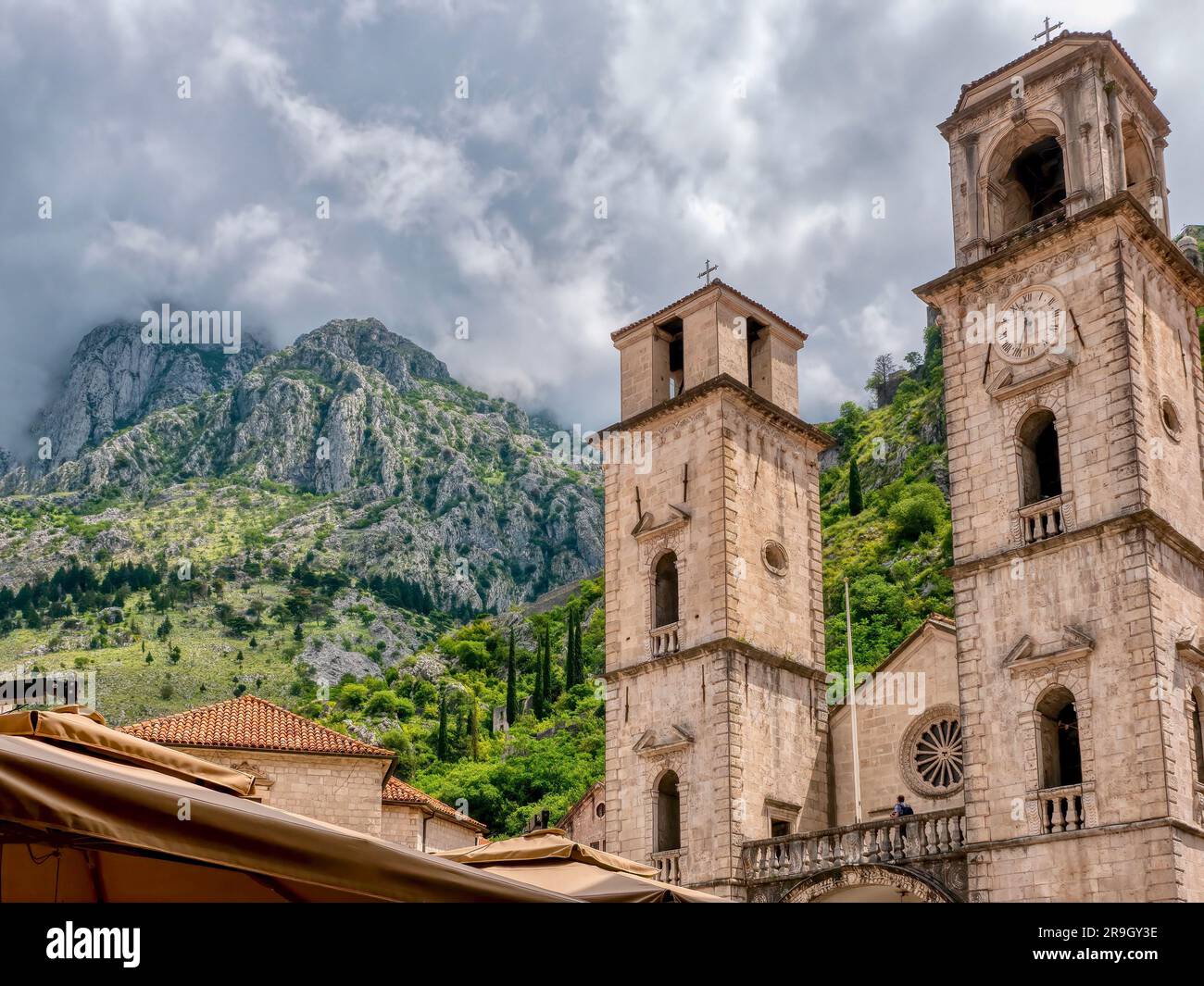 In Old Kotor, Montenegro, a low angle view of the two stone bell towers ...