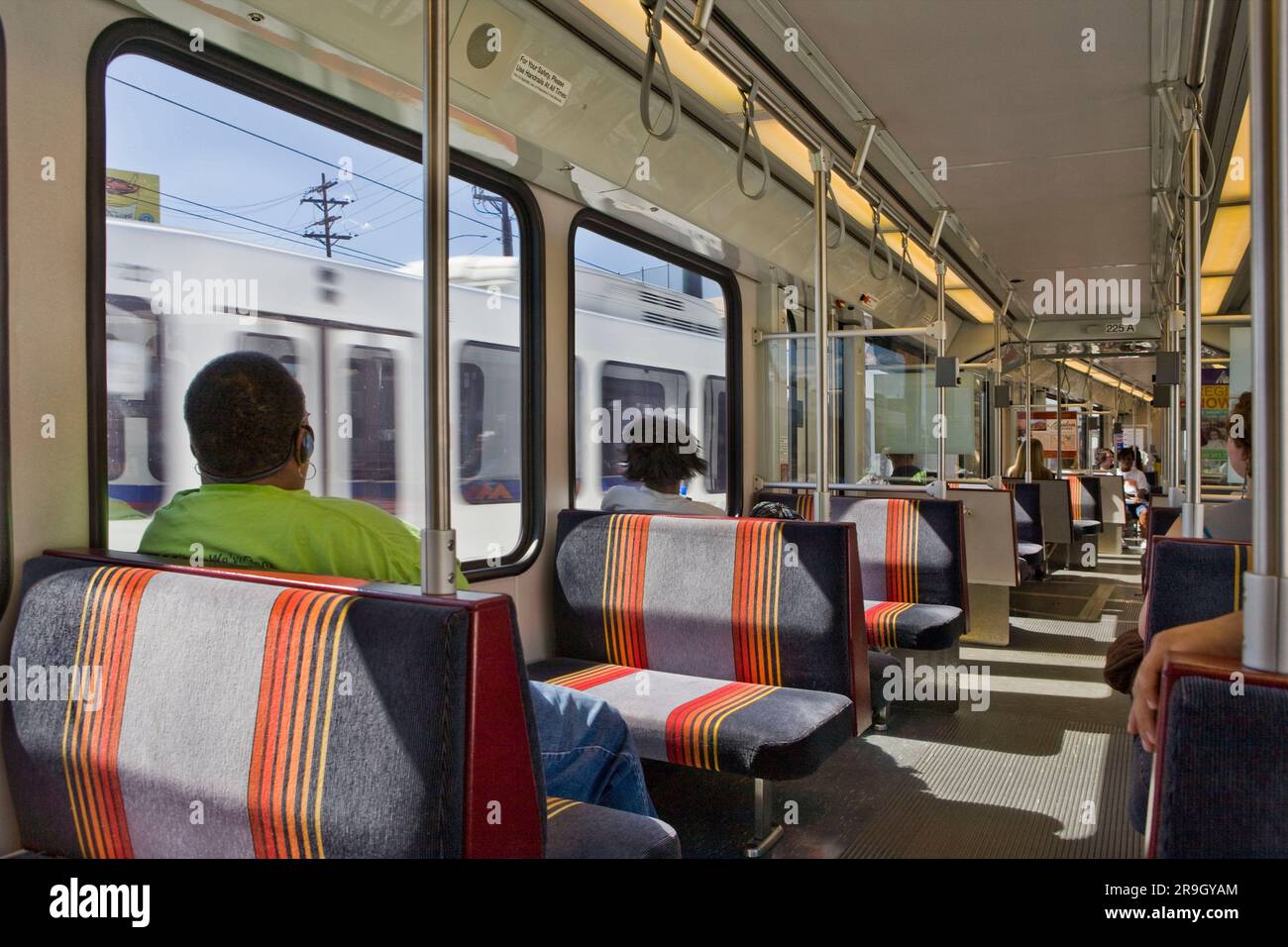 Interior Light Rail trains pass Denver CO Stock Photo - Alamy