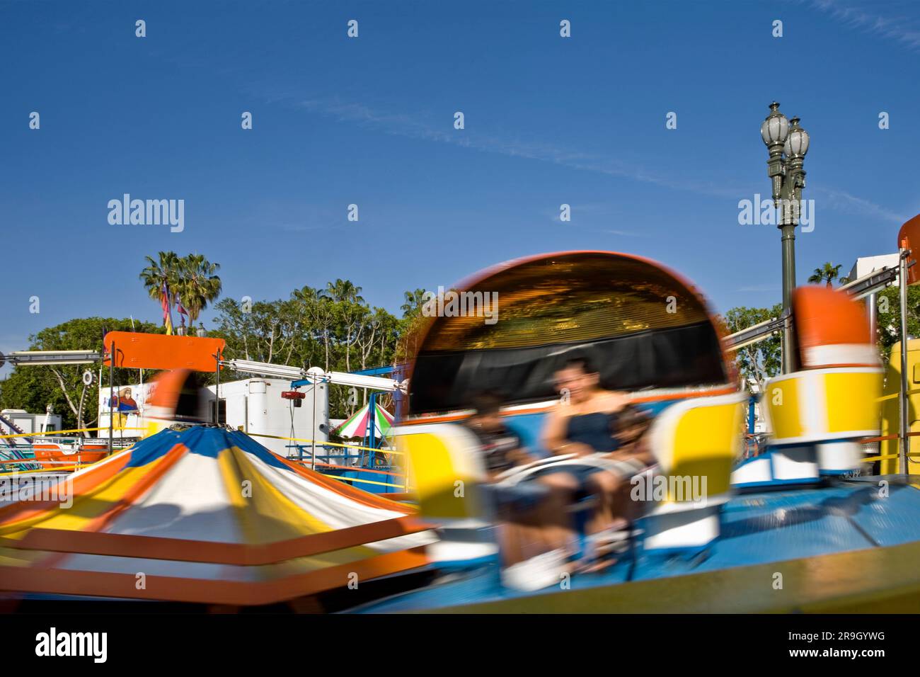 Tilt-a-whirl carnival ride in Los Angeles, CA Stock Photo - Alamy