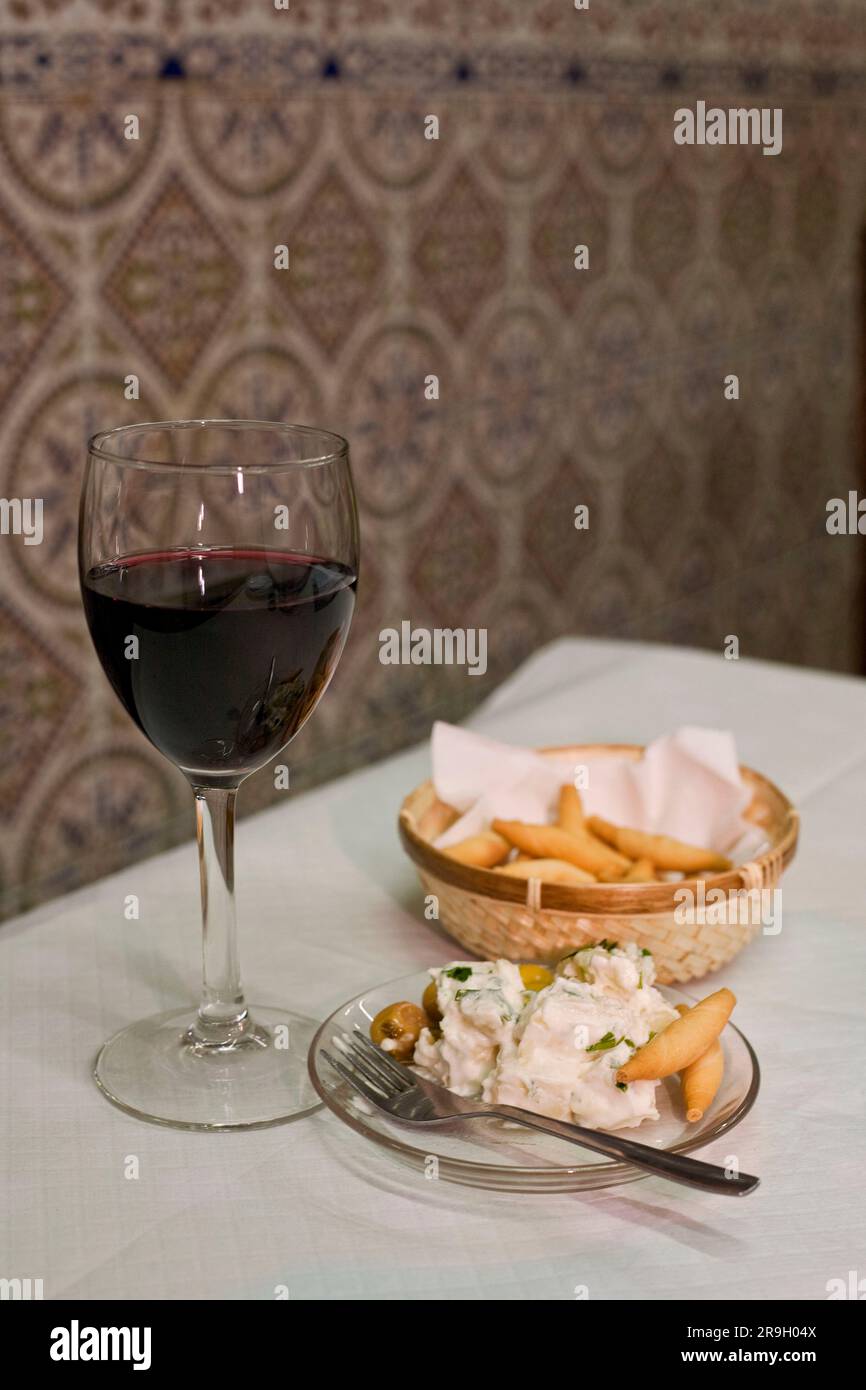 Glass of red wine and chips hi-res stock photography and images - Alamy