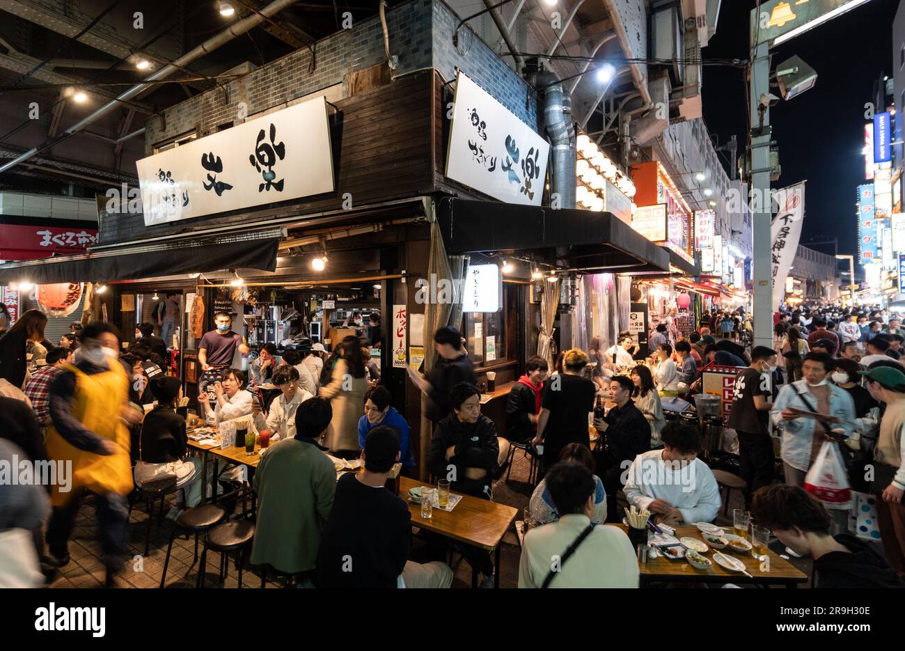 Tokyo, Japan - May 03 2023: People eat out in a traditional Yakitori ...