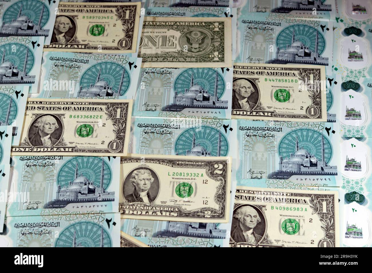Background of USD American dollars money bills with the new Egyptian 20 ...