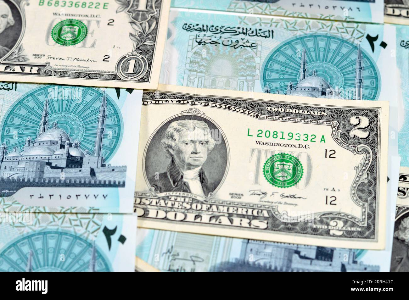 Background of USD American dollars money bills with the new Egyptian 20 ...