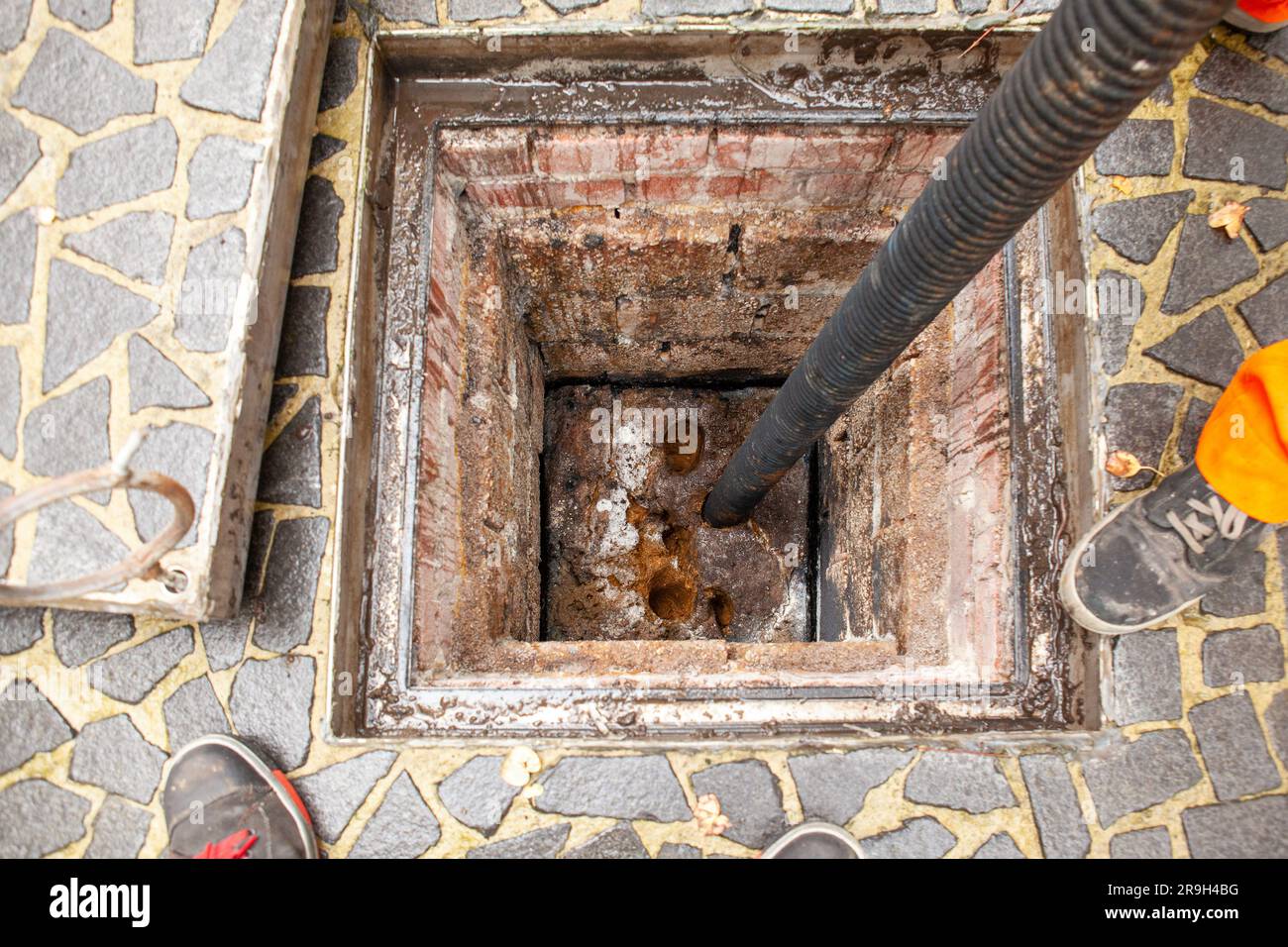 Next to a large building for the students, the Cesspool overflows Stock ...
