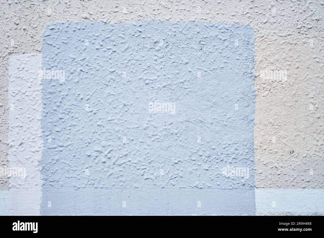 Warm colored blue background with the texture of rough grainy stone ...