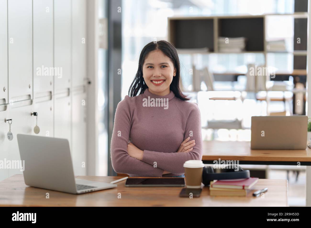 Young student studying in classroom at college. Student working at ...