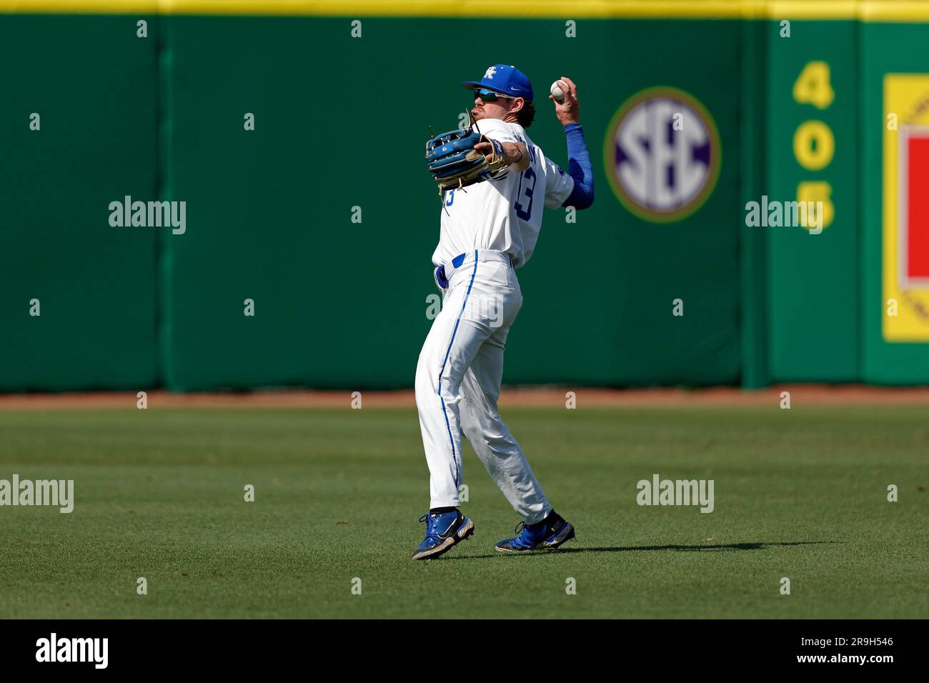 Kentucky infielder James McCoy (13) warms up before an NCAA college ...