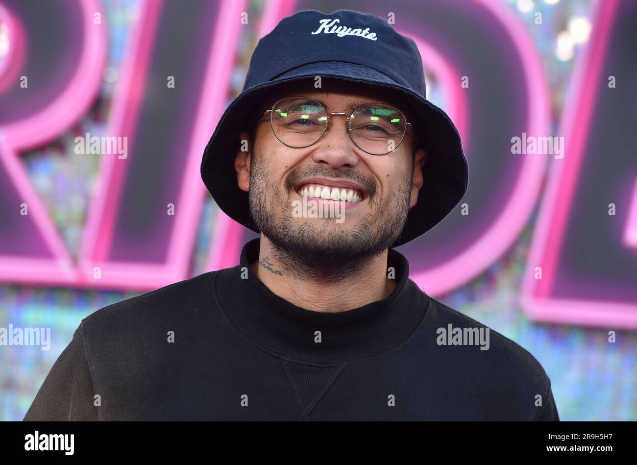 Travis Atreo arrives at the Los Angeles premiere of "Joy Ride," Monday ...
