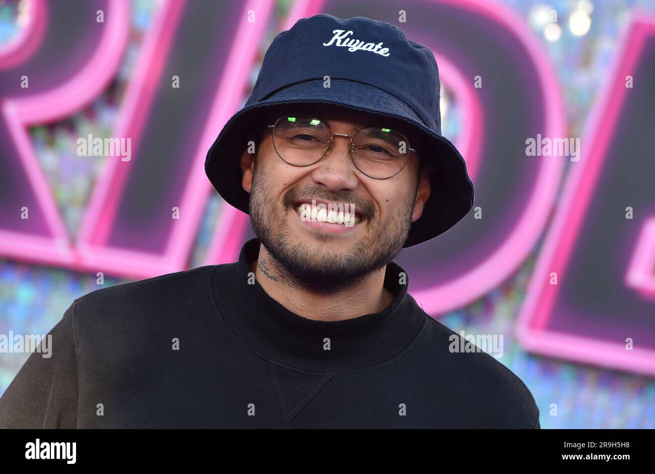 Travis Atreo arrives at the Los Angeles premiere of "Joy Ride," Monday ...