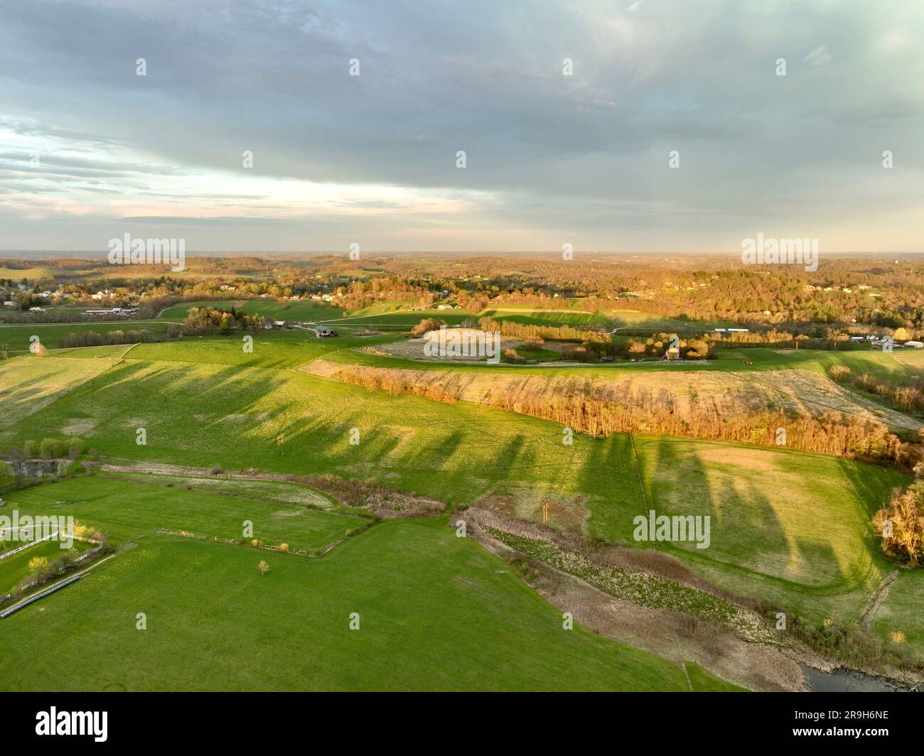 An aerial view of a rural landscape with a vast expanse of farmland in ...