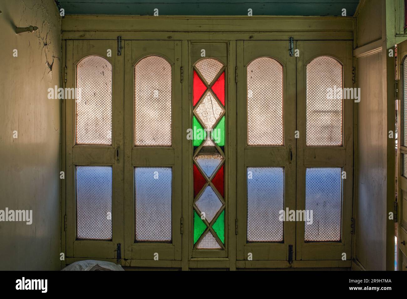 01 04 2009 Vintage old house stained glass window Saurashtra Gujarat ...