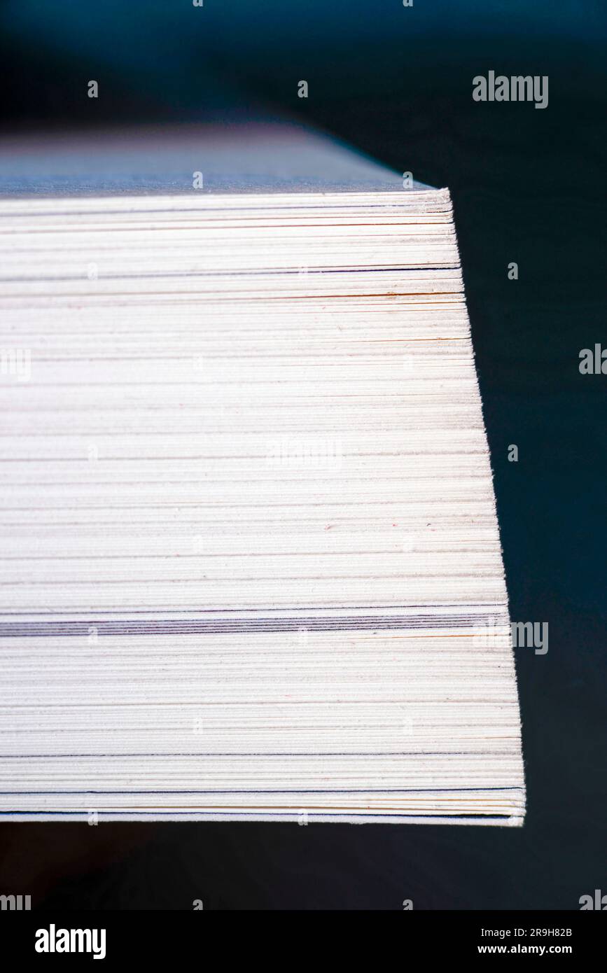 thick paper stack fragment with sharp focus on corner Stock Photo - Alamy