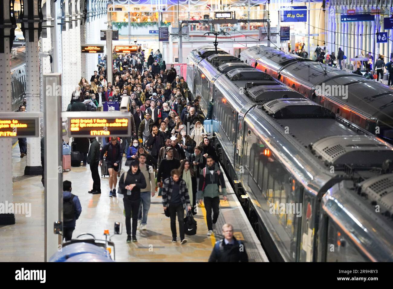 File photo dated 03/02/23 of passengers in Paddington station in London ...