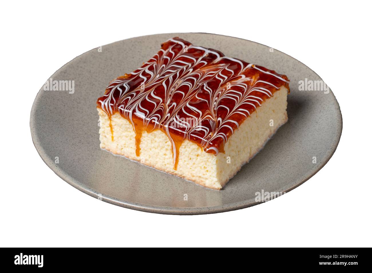 Trilece cake slice isolated on white background. Milk and caramel cake ...