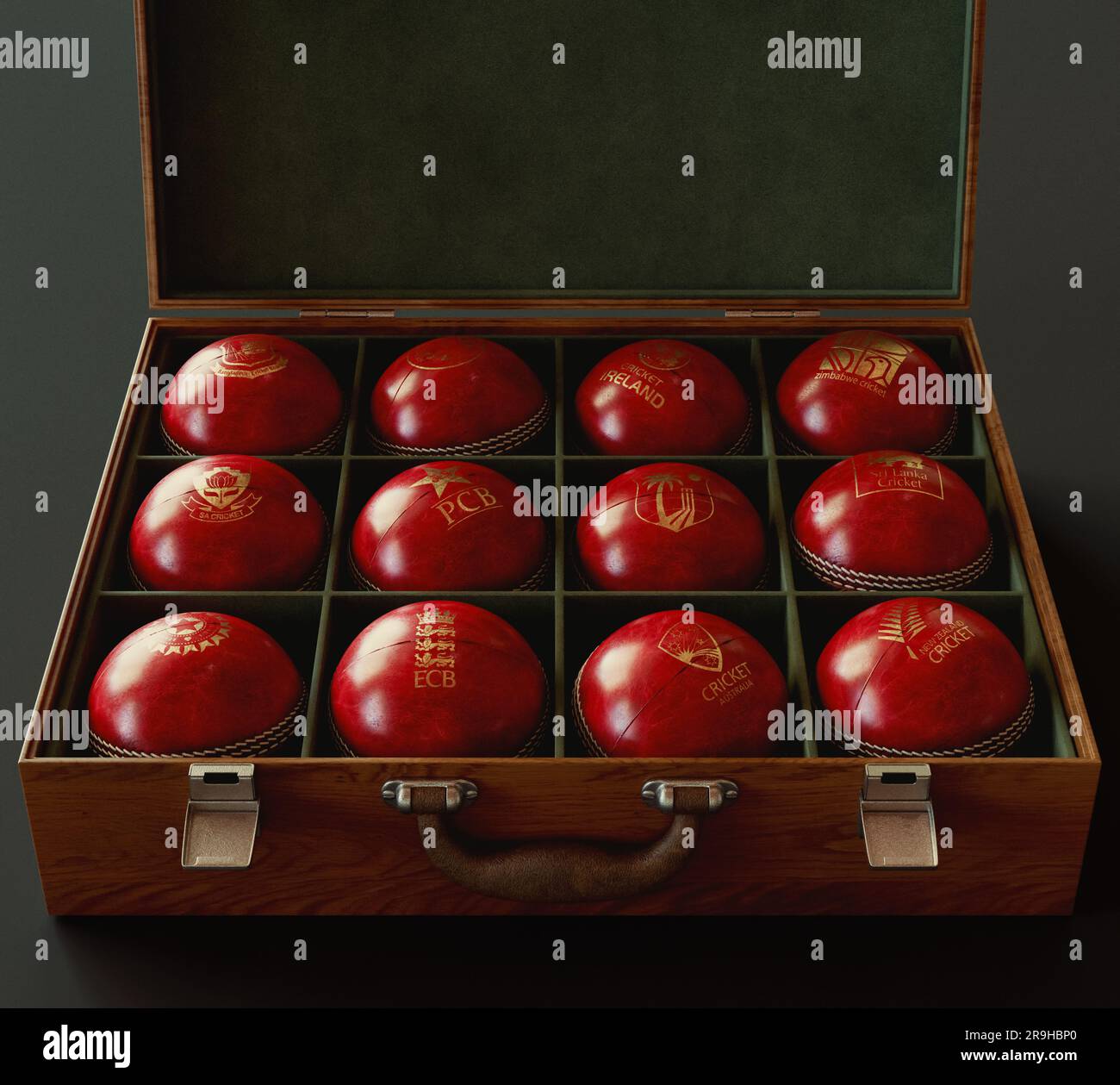 A collection of red cricket balls imprinted with gold logos of the ...