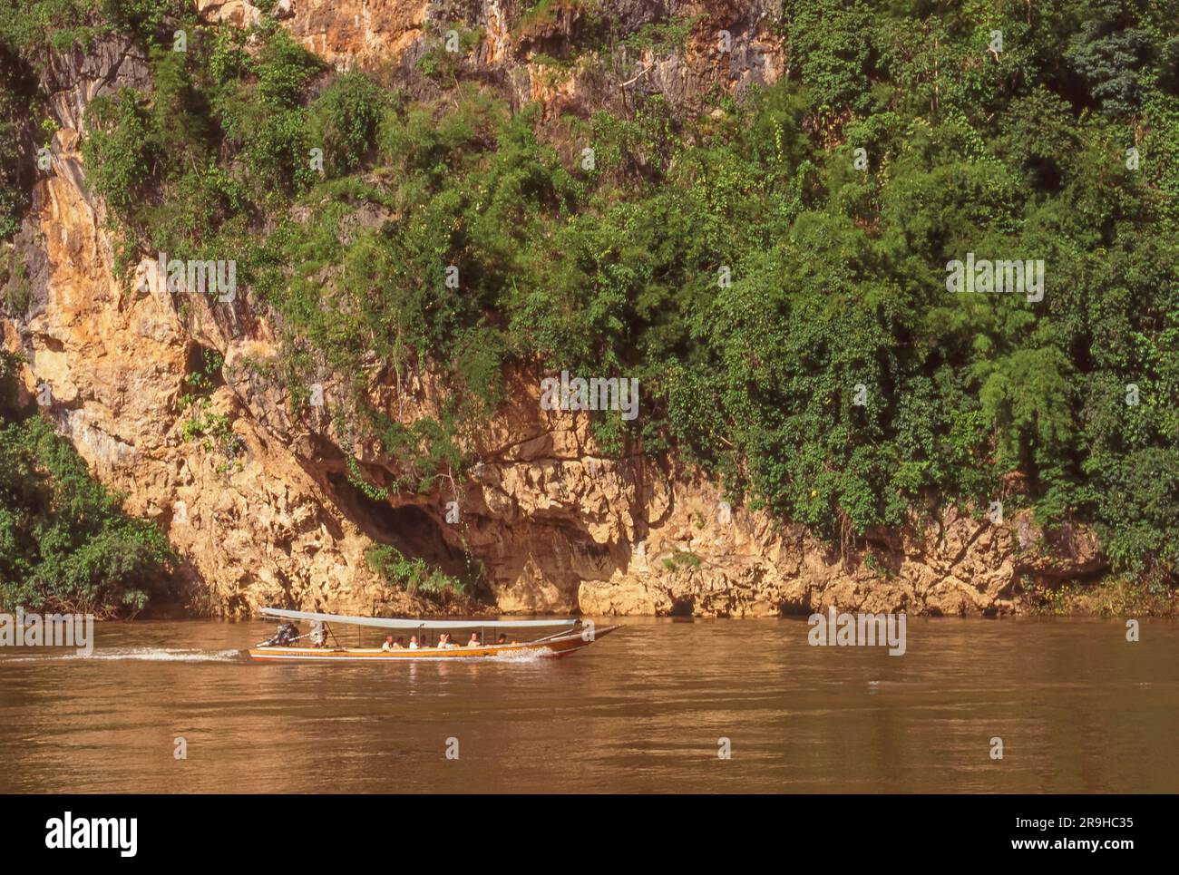 A long-tail boat on the River Kwai (more correctly Khwae Noi River or ...